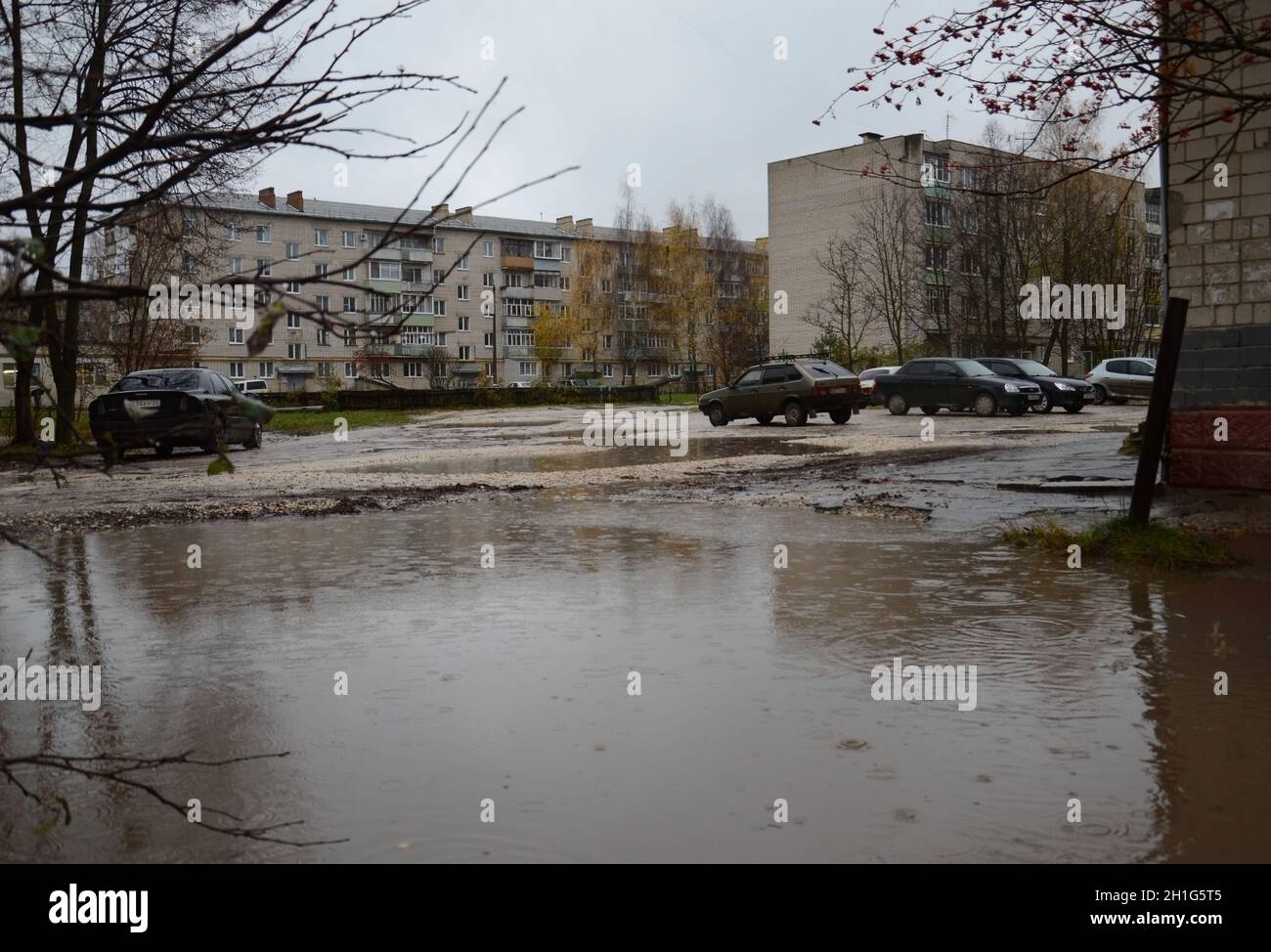 Kovrov, Russia. 31 October 2017. Puddle on the road in the rainy day in ...