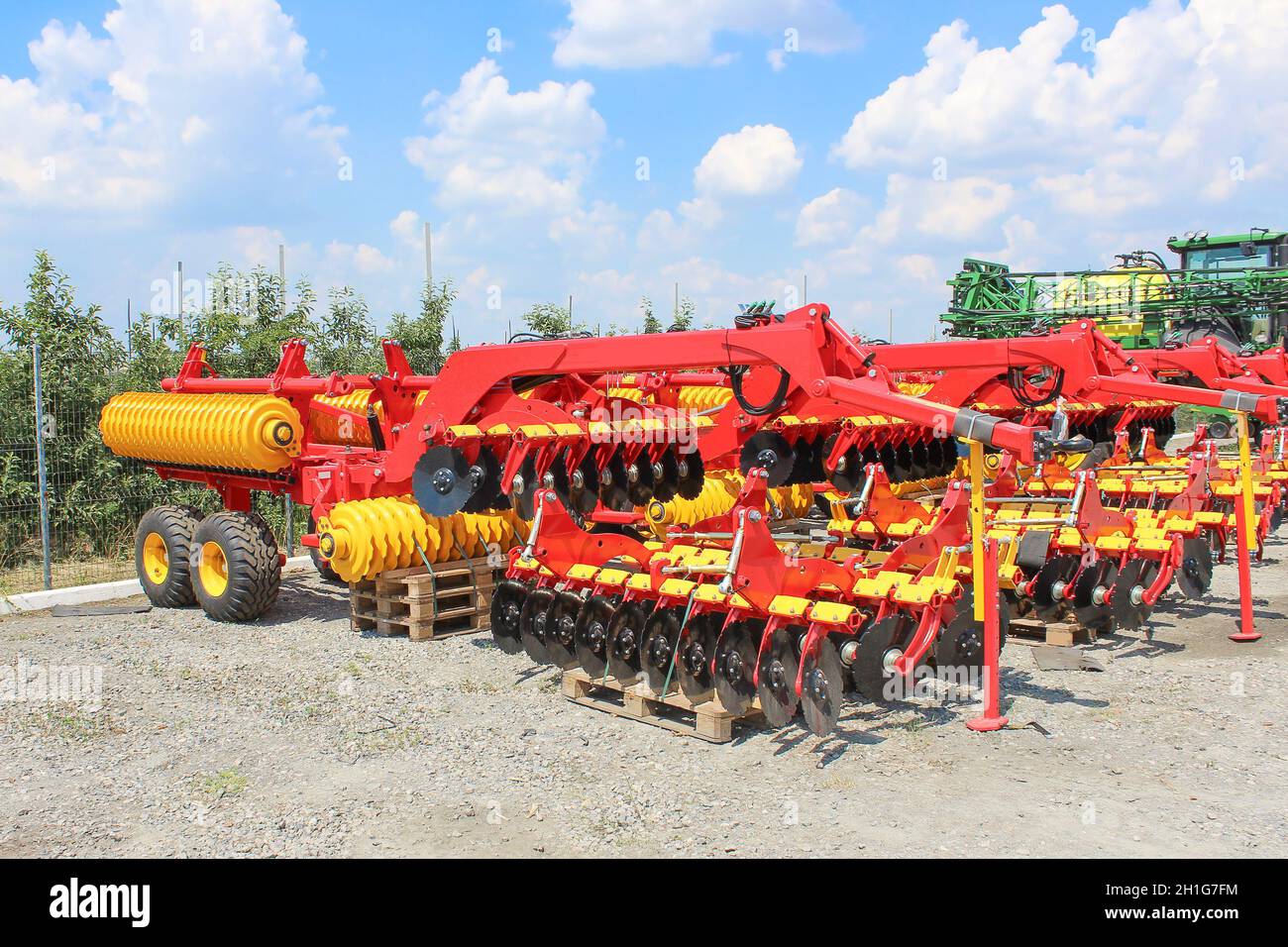 Tractor towing harrow hi-res stock photography and images - Alamy