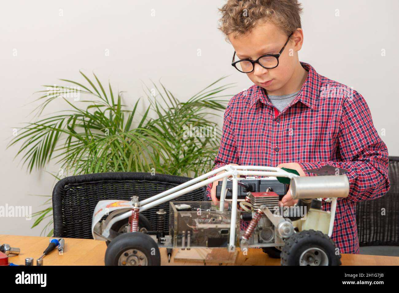 Boy repairing hi-res stock photography and images - Alamy