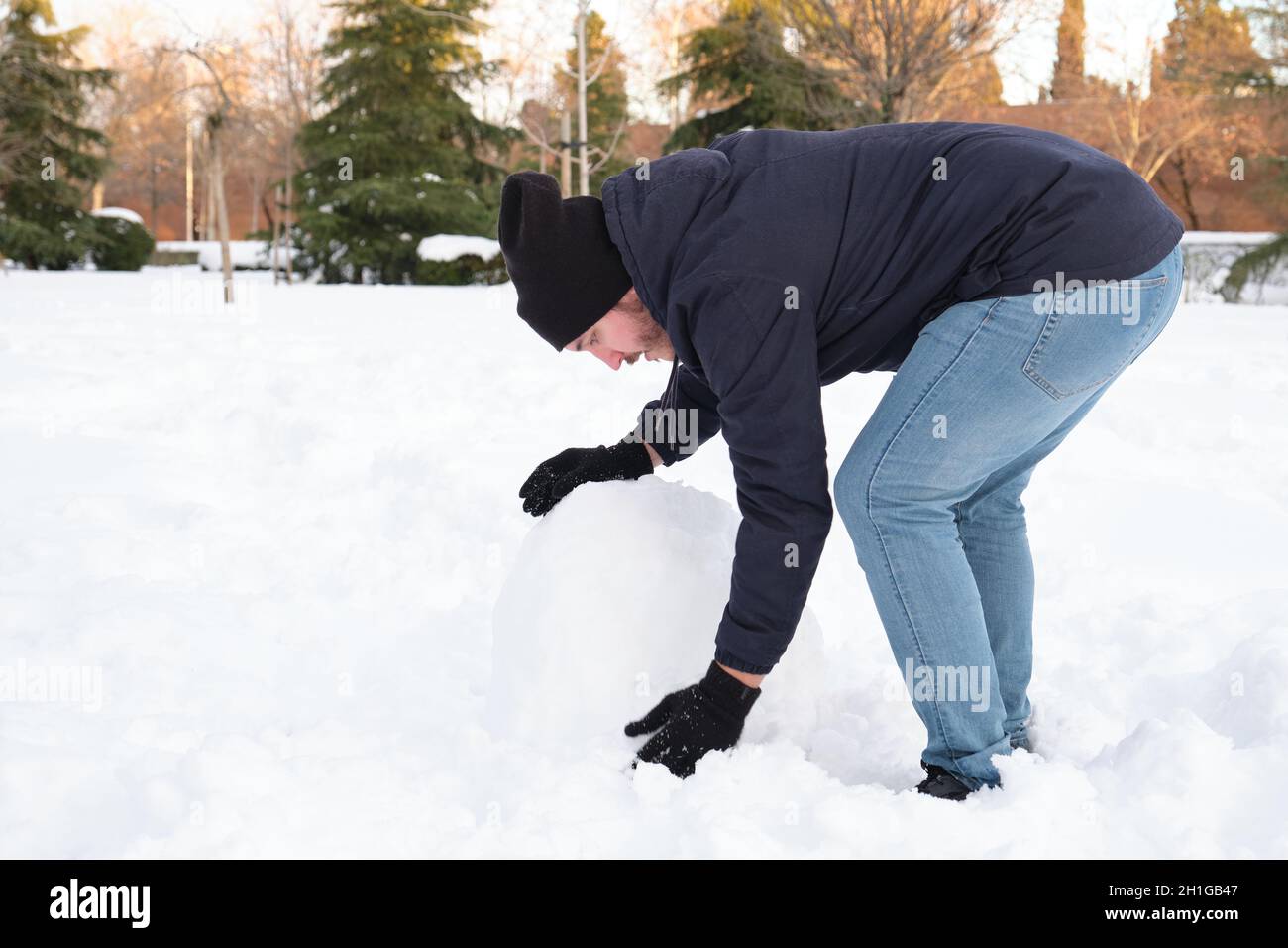 Snowball rolling hi-res stock photography and images - Alamy