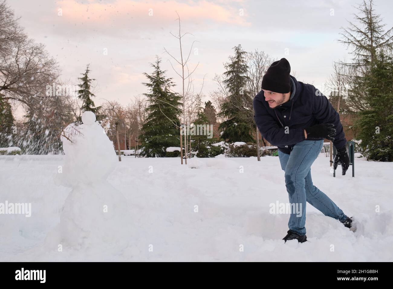 Throwing snowman hi-res stock photography and images - Alamy