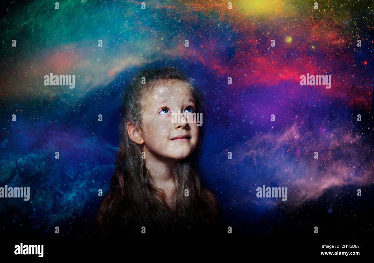 Childhood and dream concept. Conceptual image with girl dreaming about ...