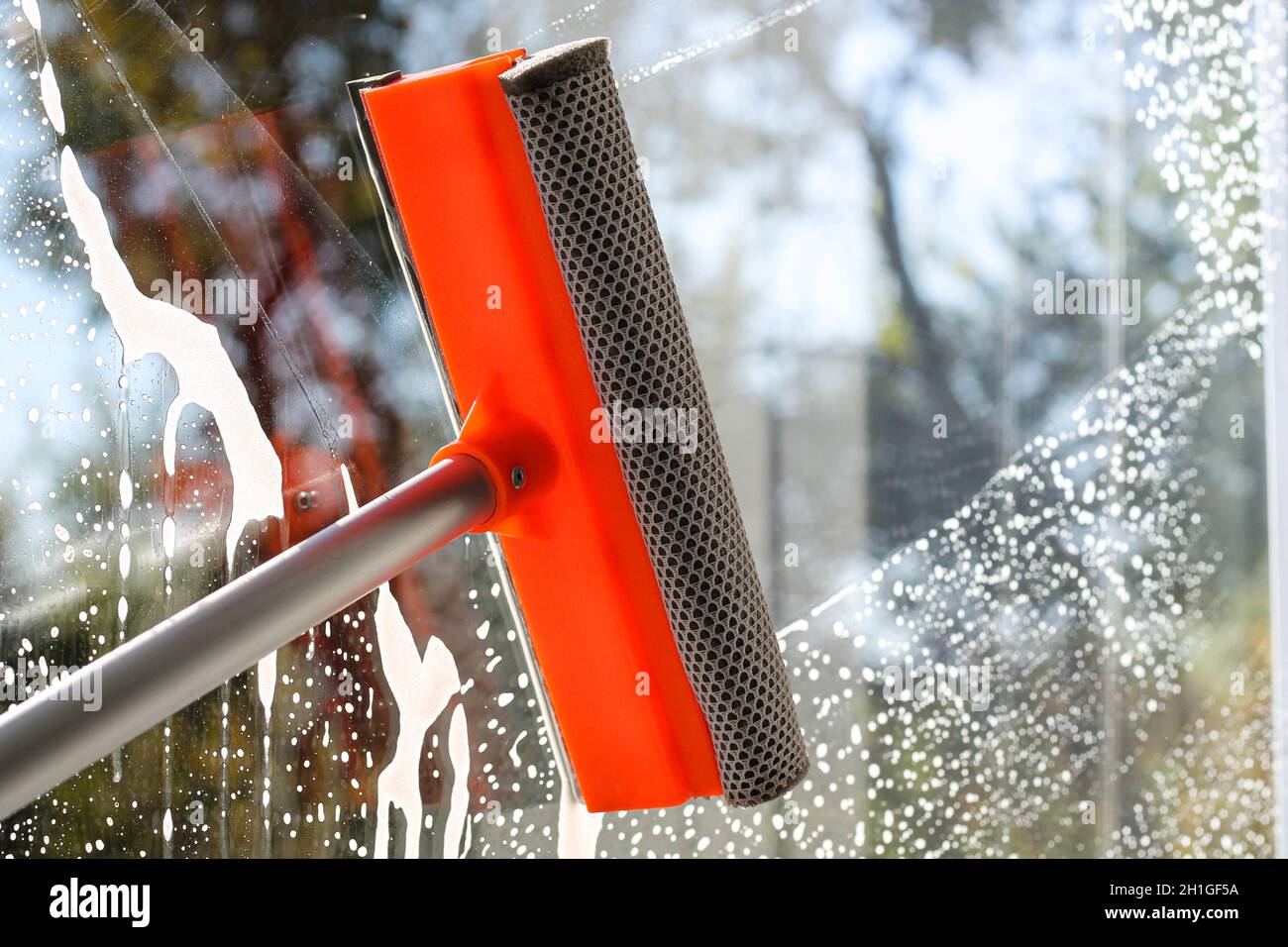 Person washing cleaning windows hi-res stock photography and images - Alamy