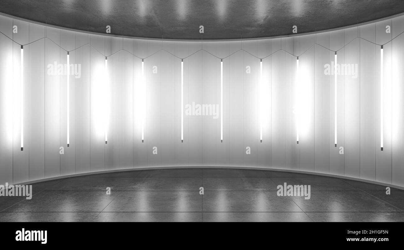 Light from lamps on the walls of the circular stage. Grey minimalistic ...