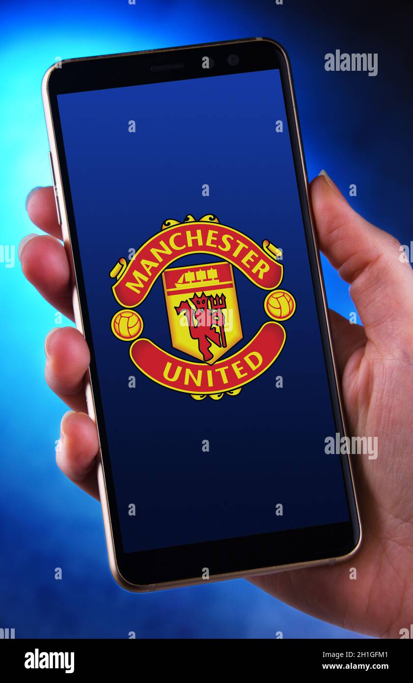 POZNAN, POL - JUN 20, 2020: Hand holding smartphone displaying logo of ...