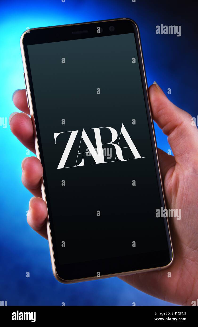 POZNAN, POL - JUN 12, 2020: Hand holding smartphone displaying logo of ...