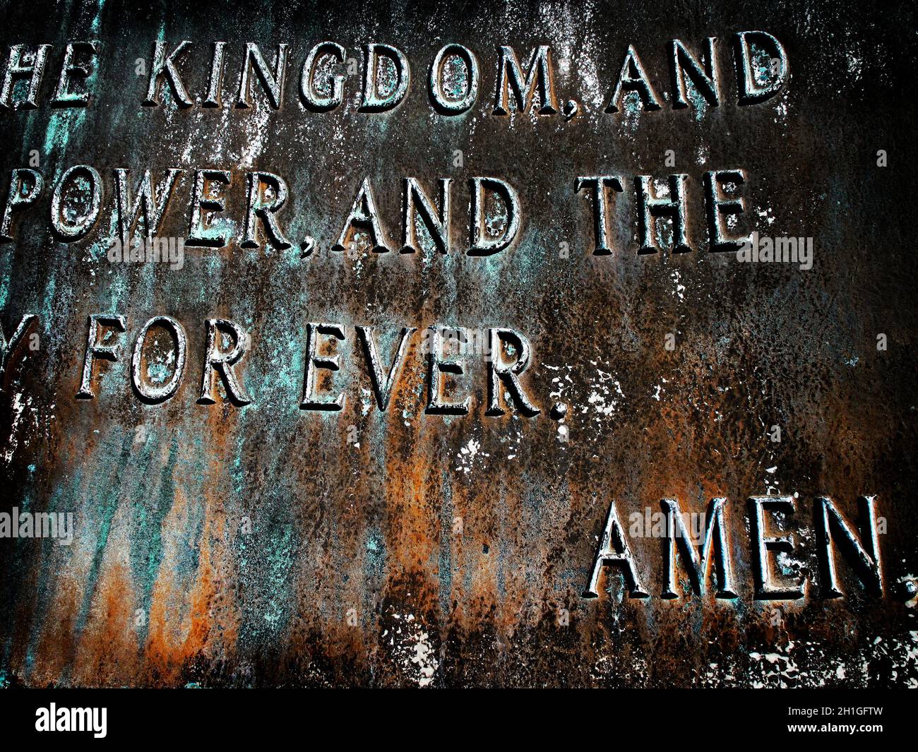 Closeup of bronze sculpture of the Lord's Prayer with focus on the word ...