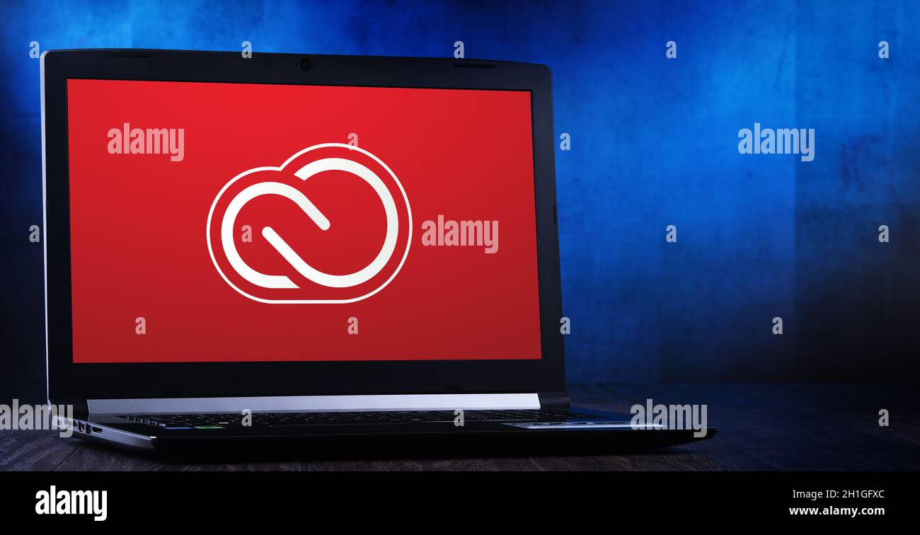 POZNAN, POL - JUL 14, 2020: Laptop computer displaying logo of Adobe ...