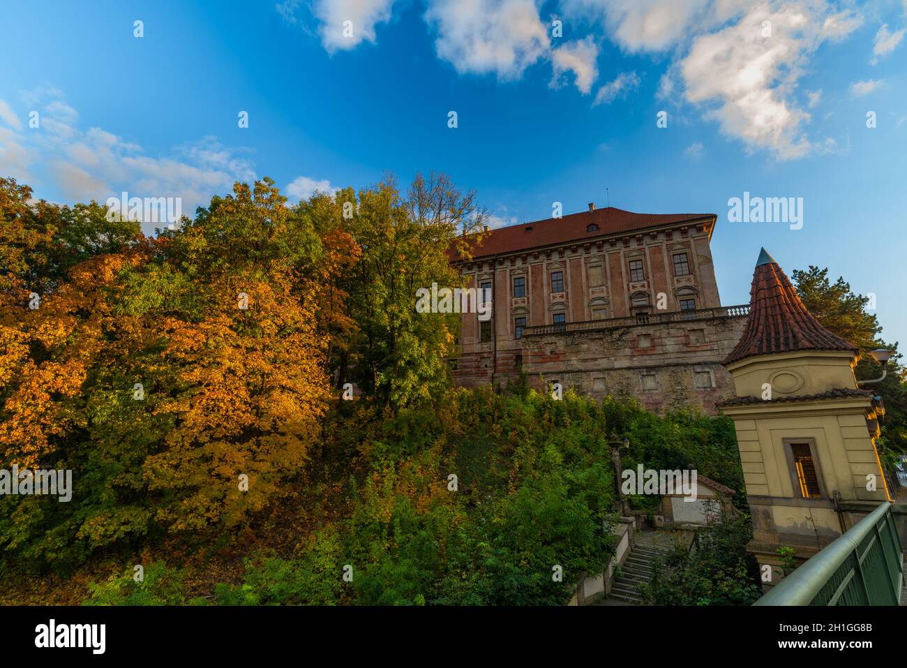 Orange sunset in Roudnice nad Labem town with old church and towers ...