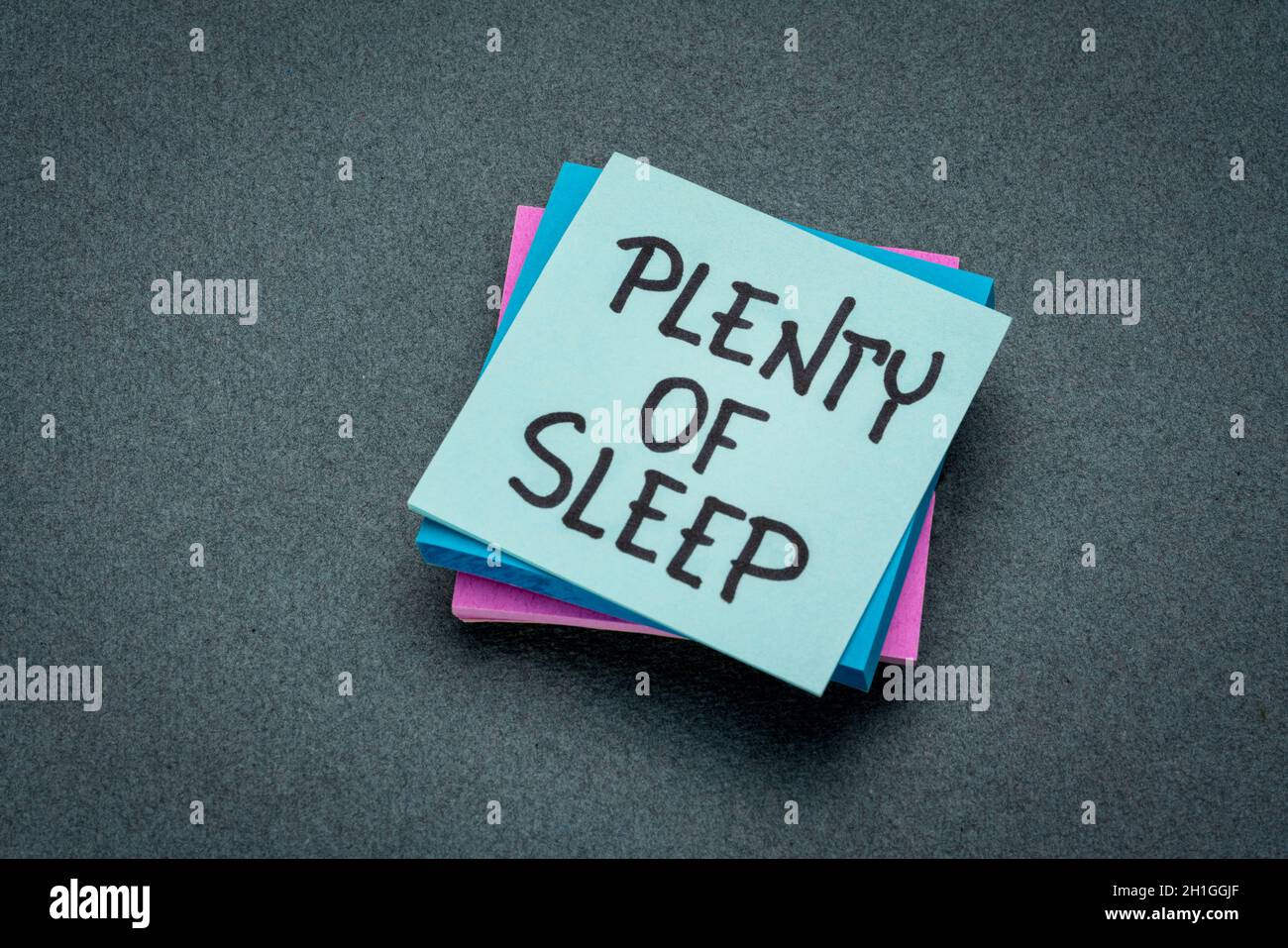 plenty of sleep, handwriting on a reminder note, healthy lifestyle ...