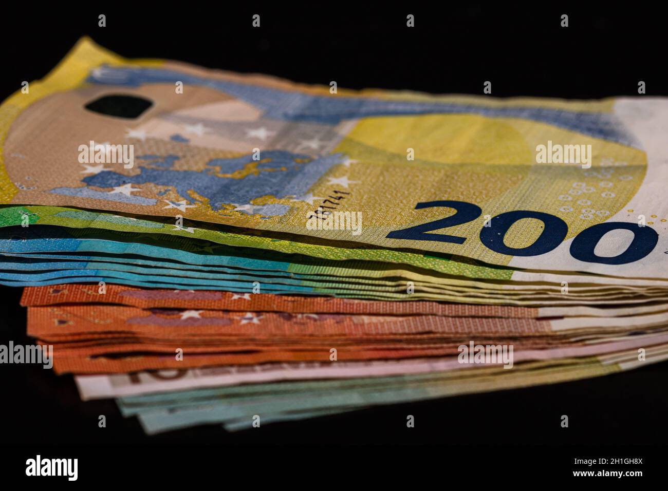 Close up on stack of EURO money. Euro banknotes isolated Stock Photo ...