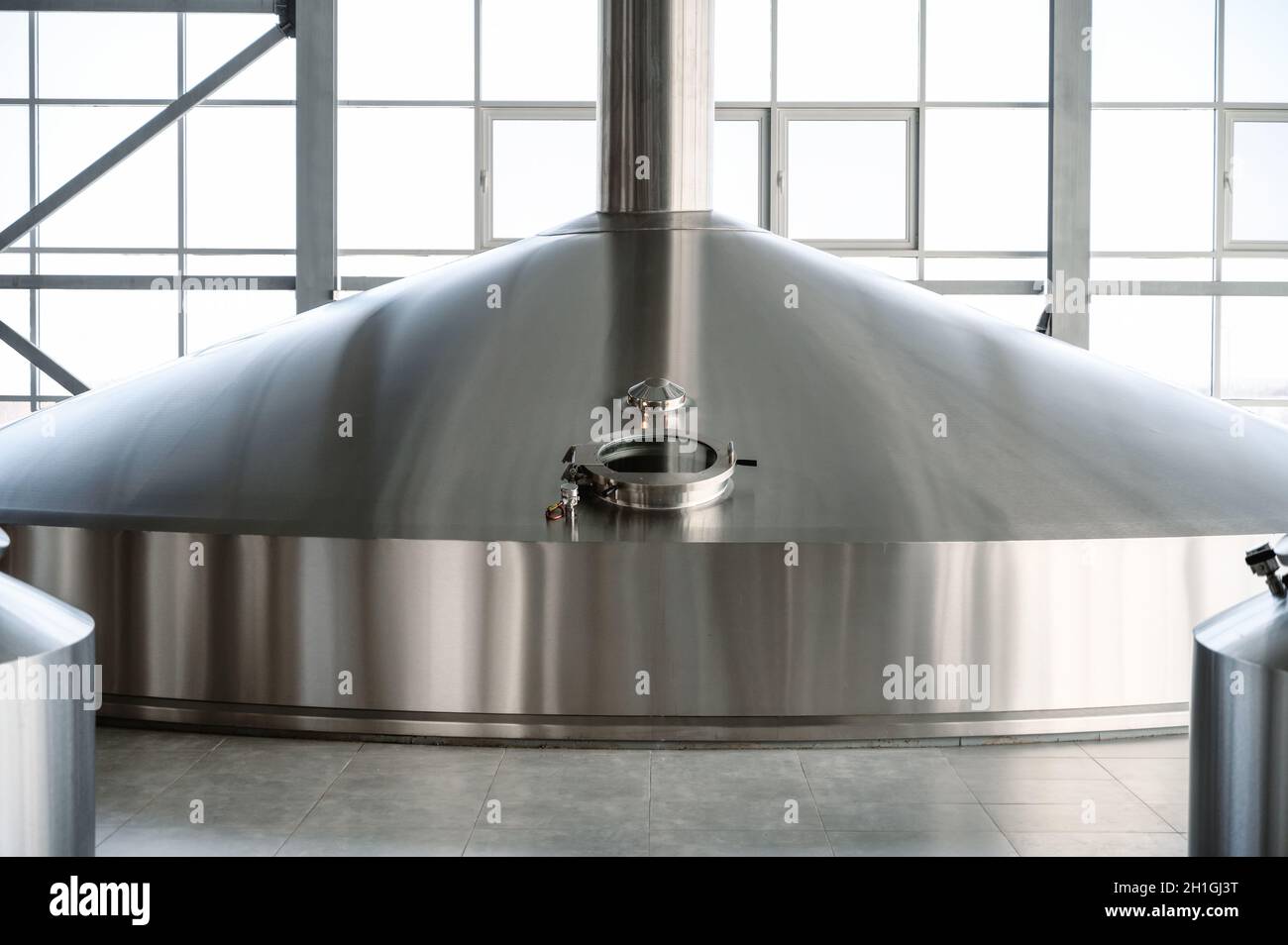 Large yeast fermentation tanks. Industrial production of beer Stock Photo - Alamy