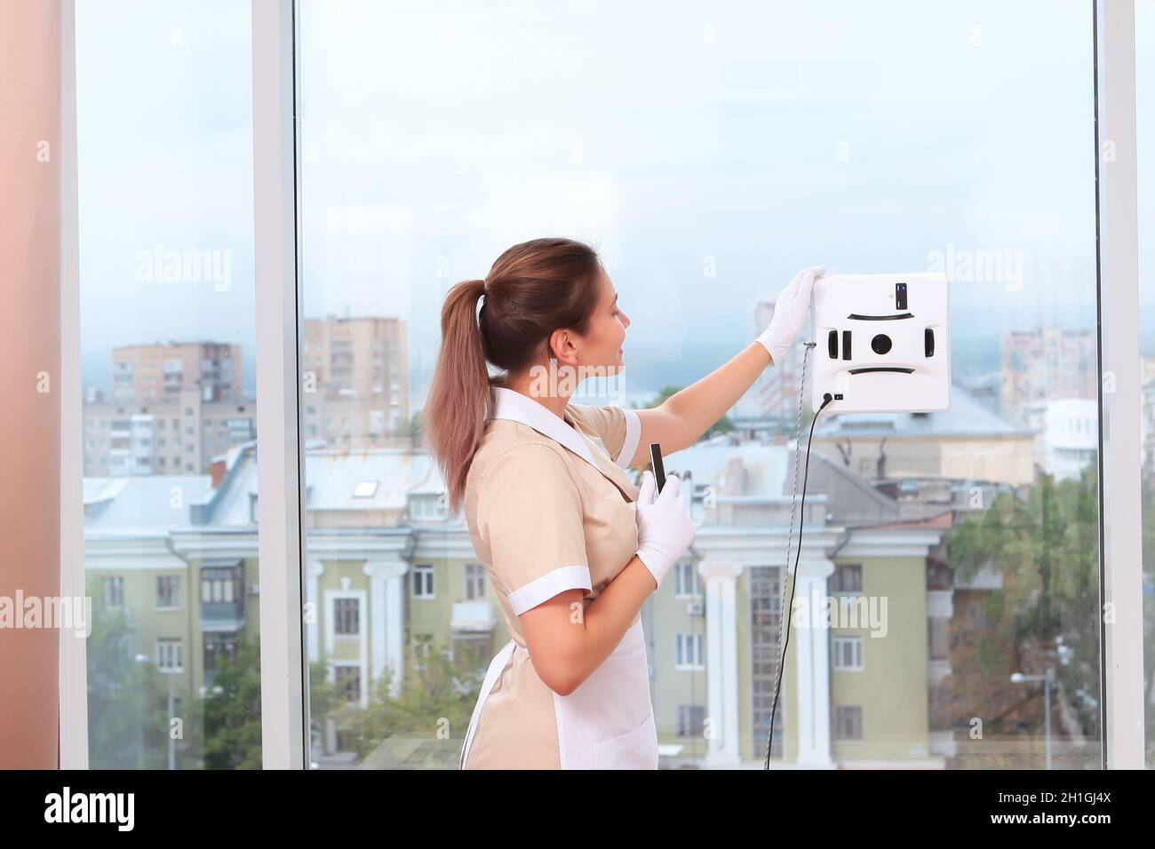 House maid in uniform cleaning house hi-res stock photography and ...