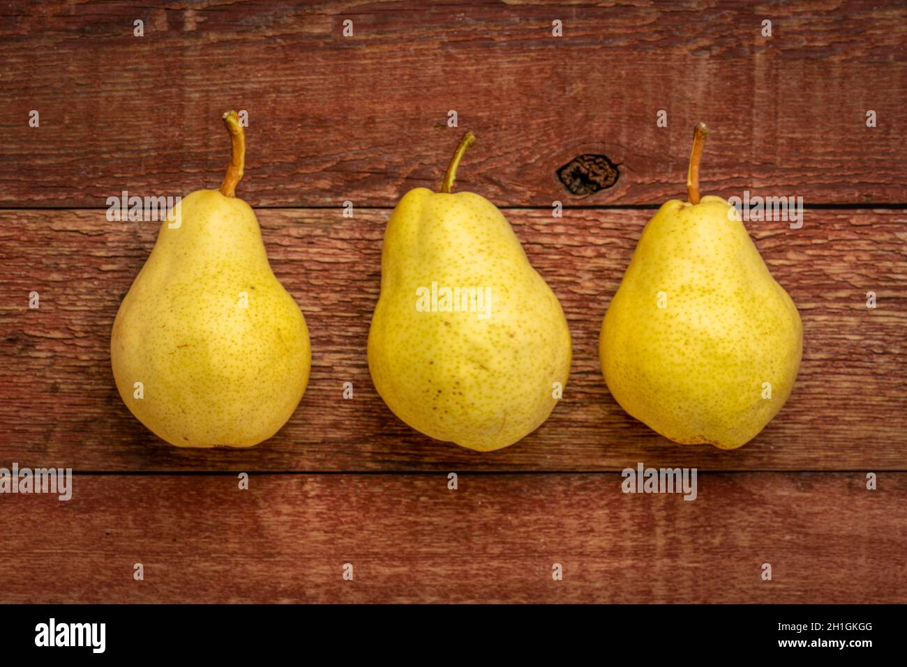Three red and yellow pears hi-res stock photography and images - Alamy