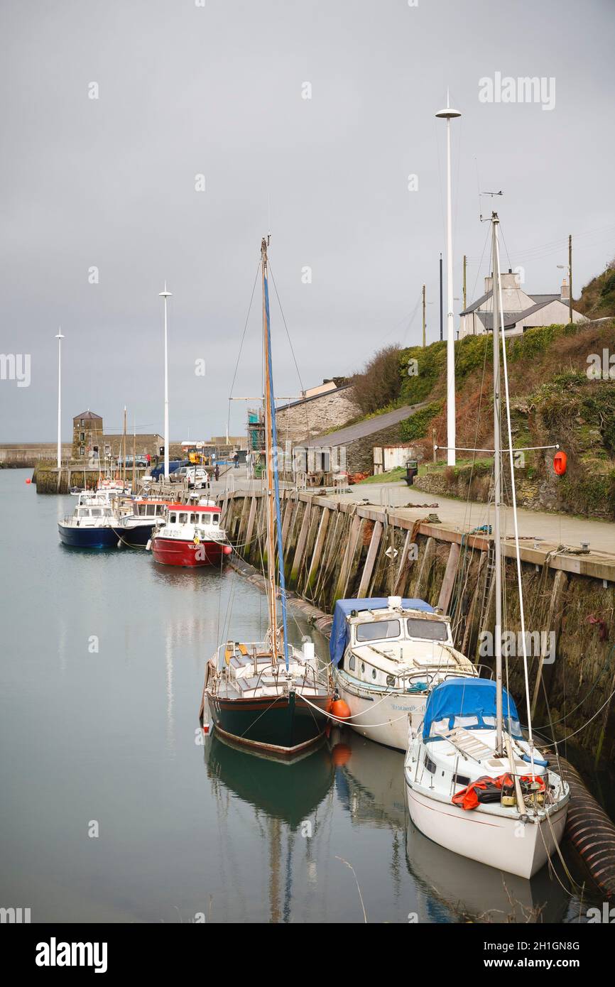 ANGLESEY, UK - February 28, 2012. Yachts and fishing boats in an old ...