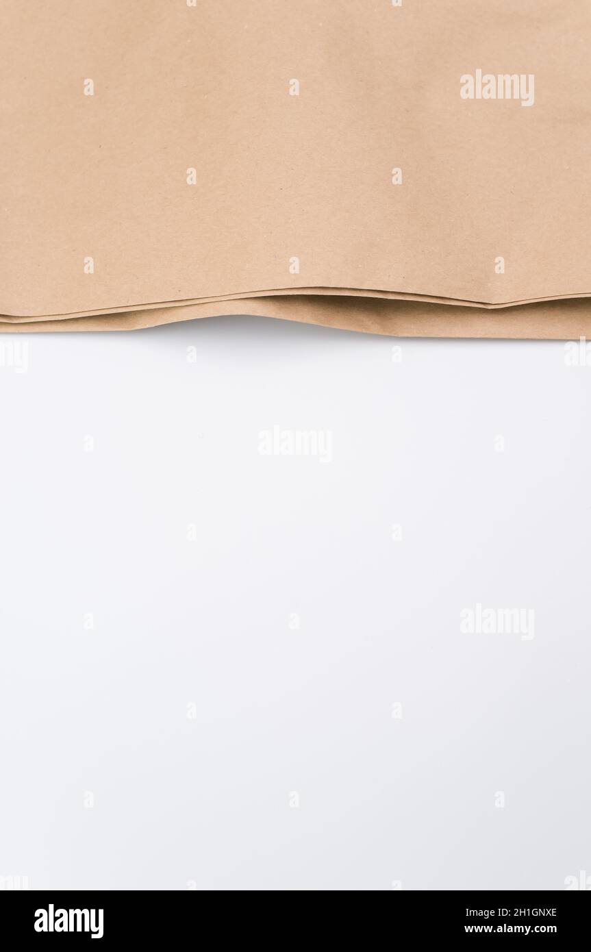 recycled brown Kraft paper folded on white background Stock Photo - Alamy