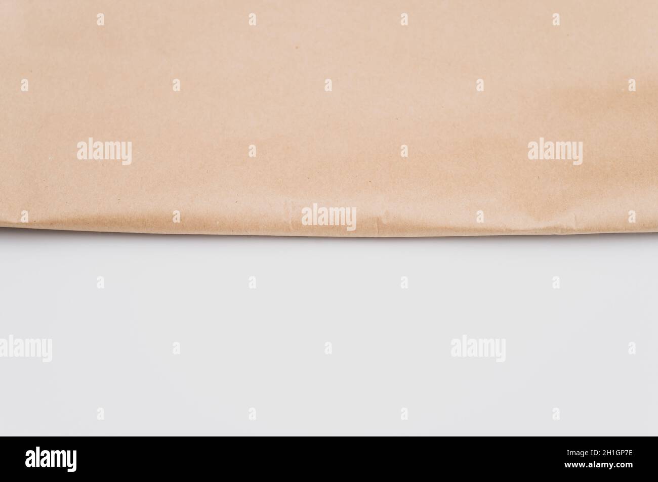 recycled brown Kraft paper folded on white background Stock Photo - Alamy