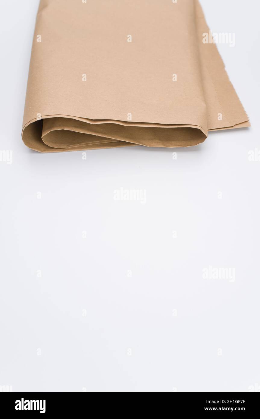 recycled brown Kraft paper folded on white background Stock Photo - Alamy
