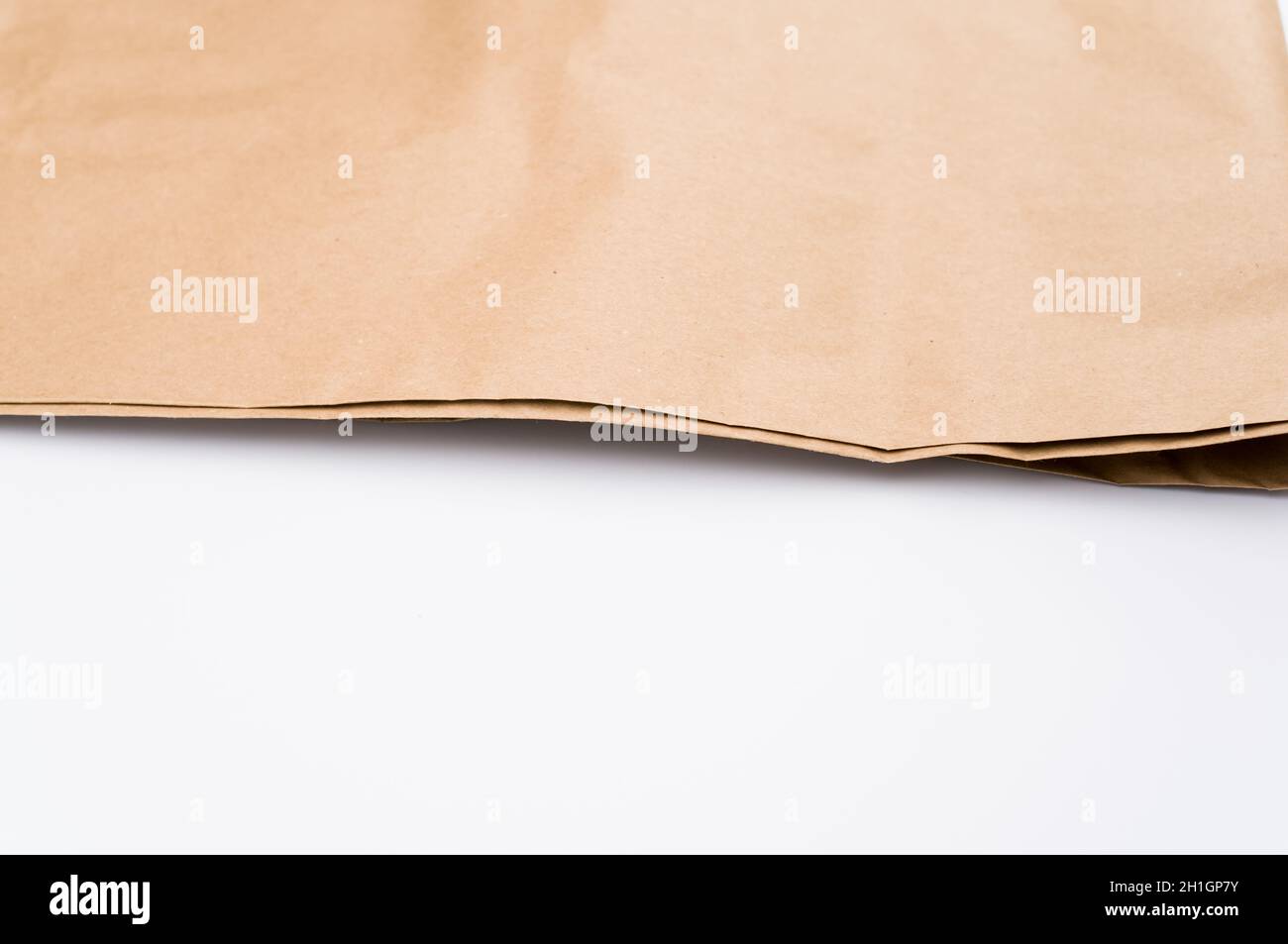 recycled brown Kraft paper folded on white background Stock Photo - Alamy