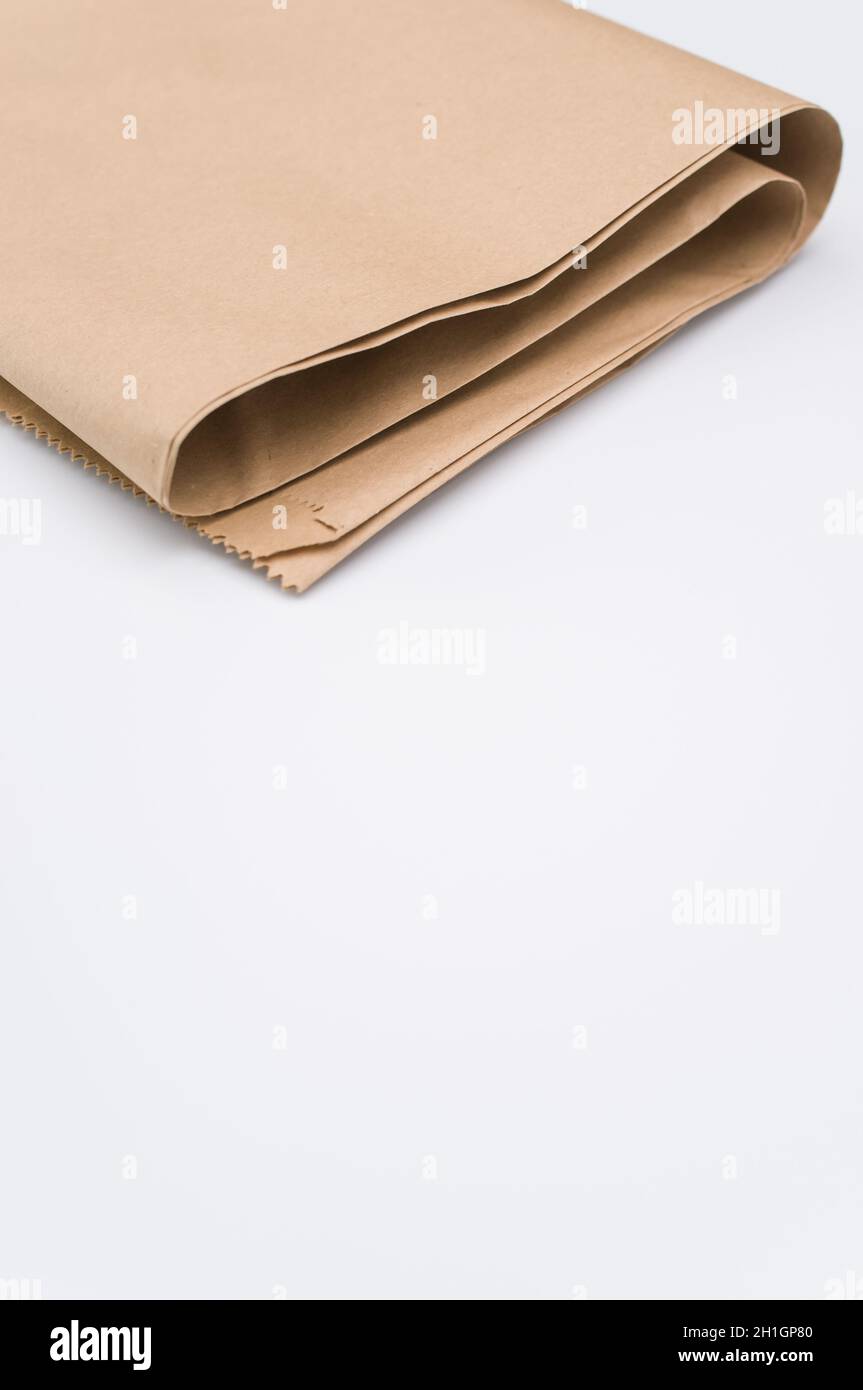 recycled brown Kraft paper folded on white background Stock Photo - Alamy