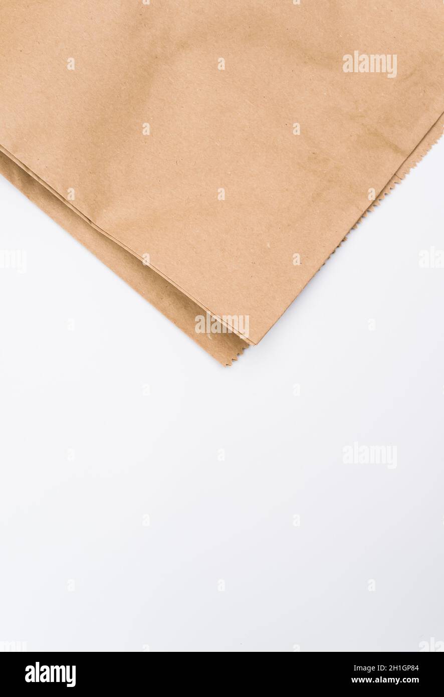 recycled brown Kraft paper folded on white background Stock Photo - Alamy