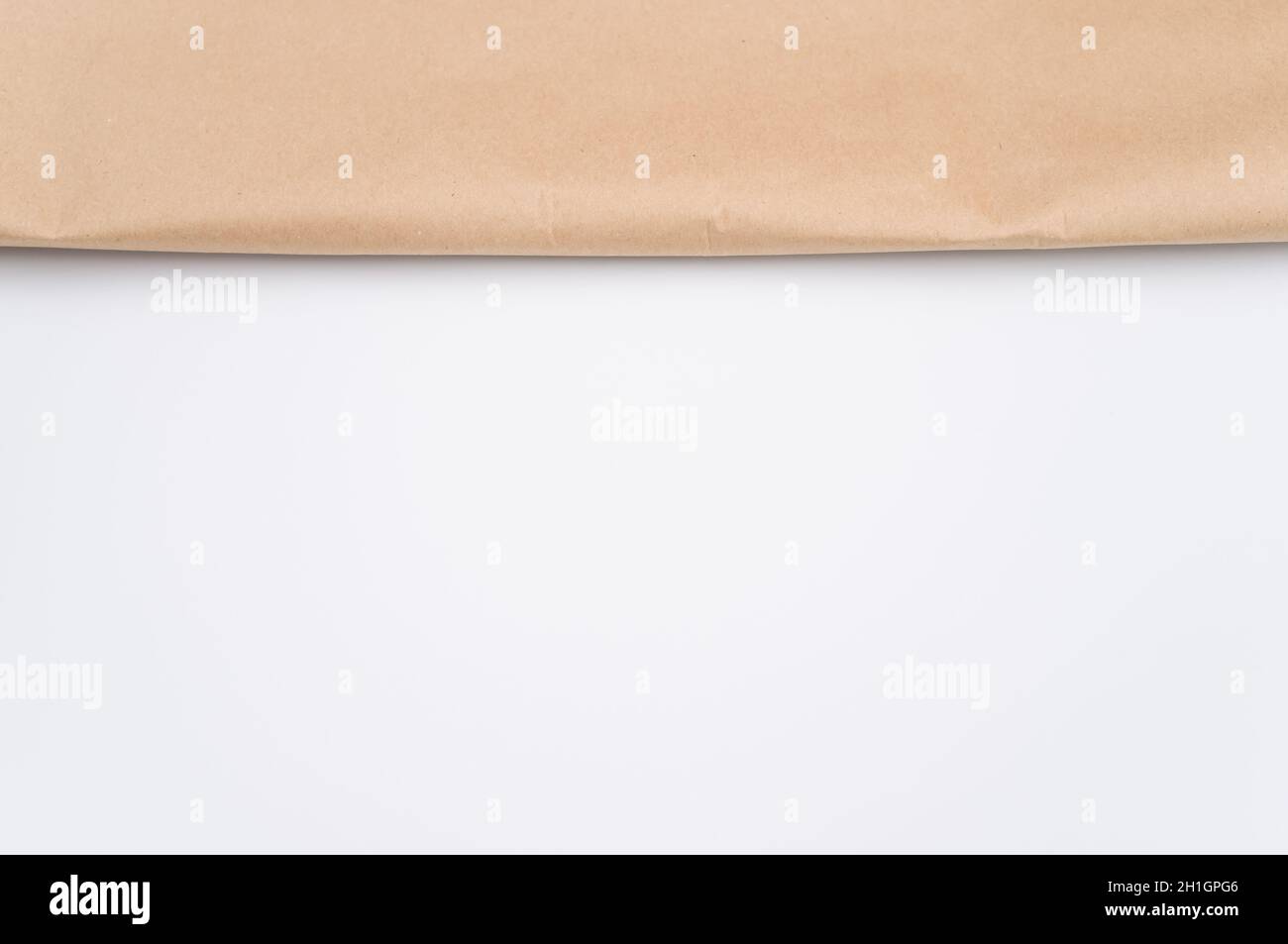 recycled brown Kraft paper folded on white background Stock Photo - Alamy