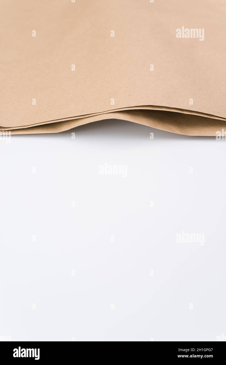 recycled brown Kraft paper folded on white background Stock Photo - Alamy