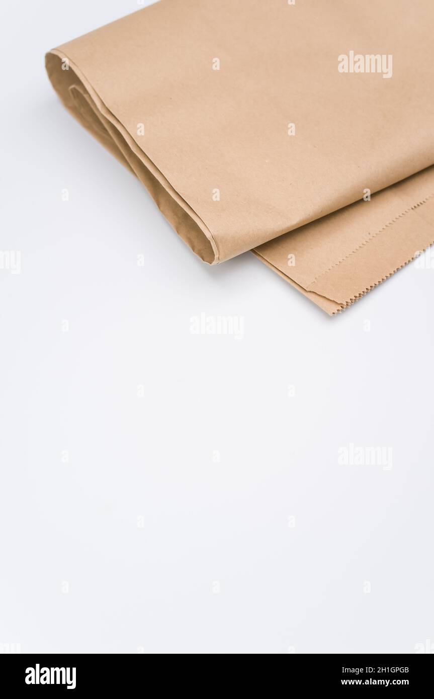 recycled brown Kraft paper folded on white background Stock Photo - Alamy