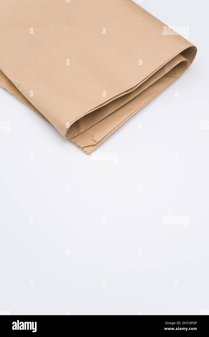 recycled brown Kraft paper folded on white background Stock Photo - Alamy