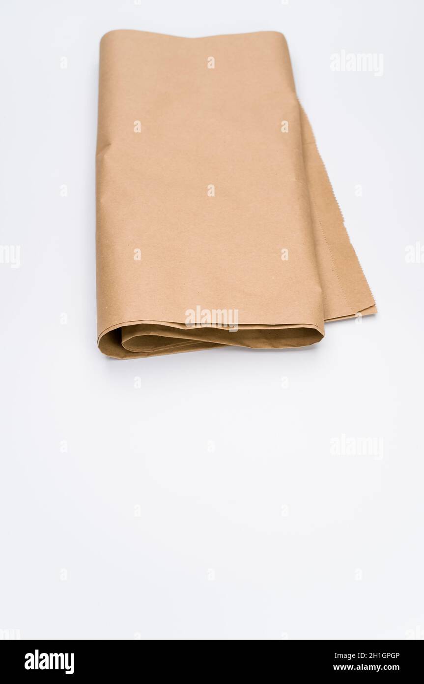 recycled brown Kraft paper folded on white background Stock Photo - Alamy