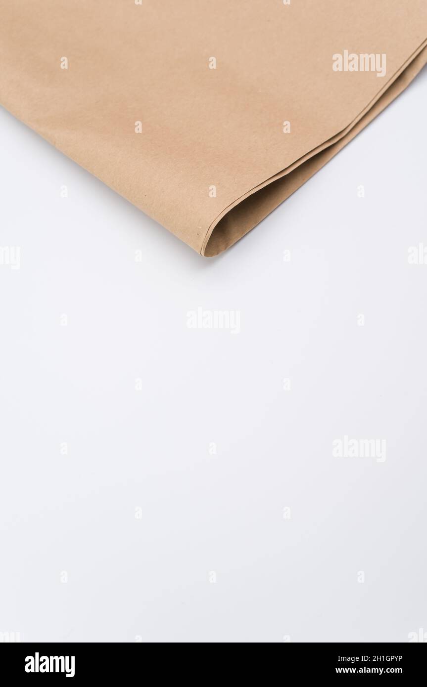 recycled brown Kraft paper folded on white background Stock Photo - Alamy