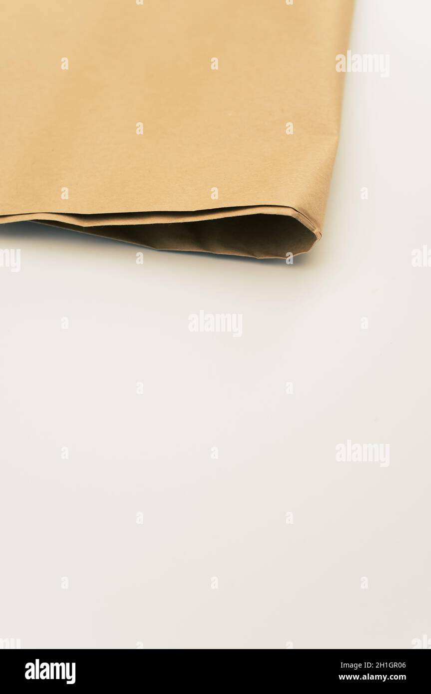 recycled brown Kraft paper folded on white background Stock Photo - Alamy