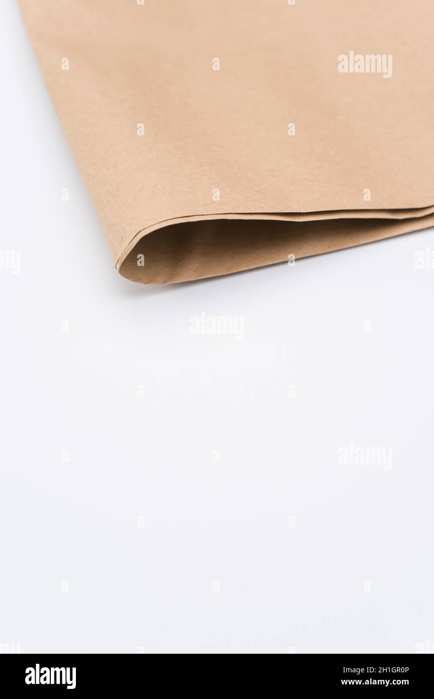 recycled brown Kraft paper folded on white background Stock Photo - Alamy