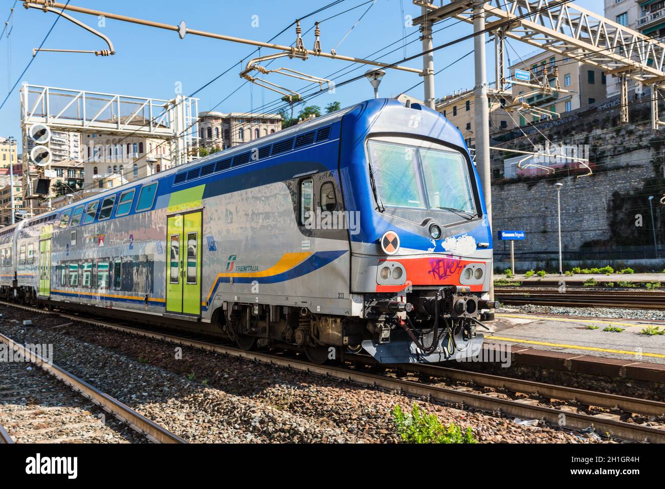 Genoa, Italy - May 15, 2017: Trenitalia passenger train arriving to the ...