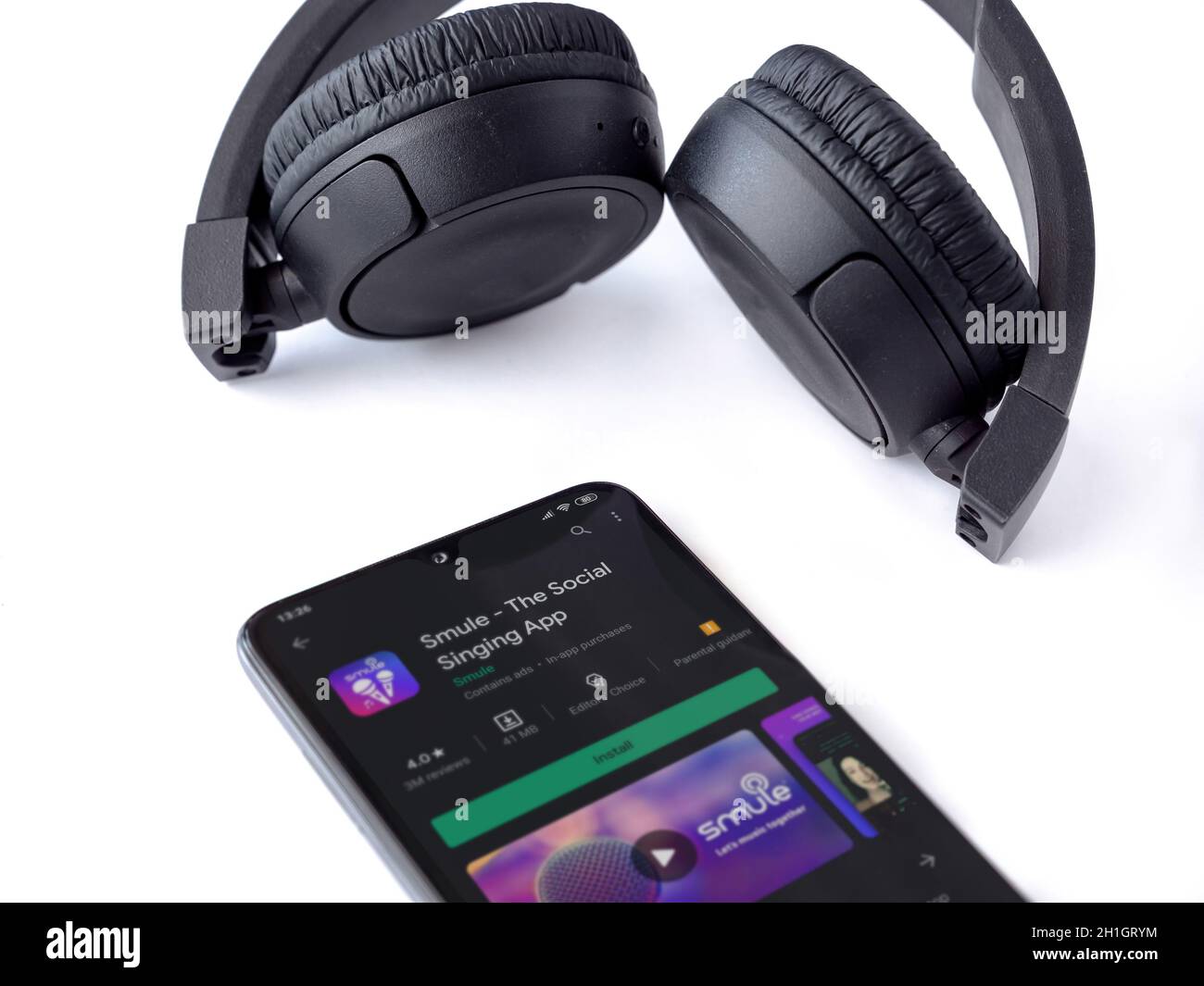 Lod, Israel - July 8, 2020: Black mobile smartphone with Smule app play ... Lod, Israel - July 8, 2020: Black mobile smartphone with Smule app play ...