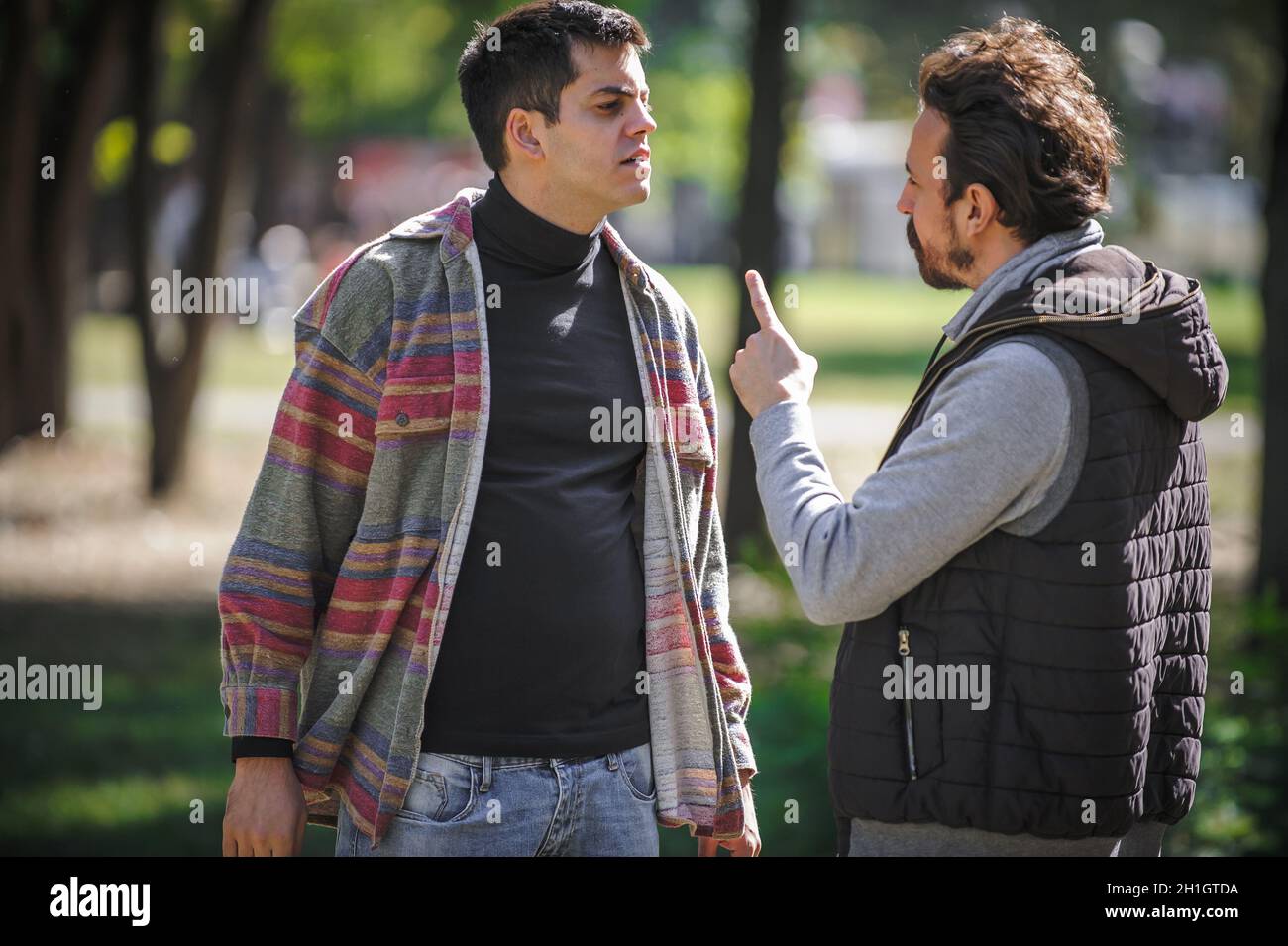 Close-up finger pointing of two very angry, nervous and upset men in an ...