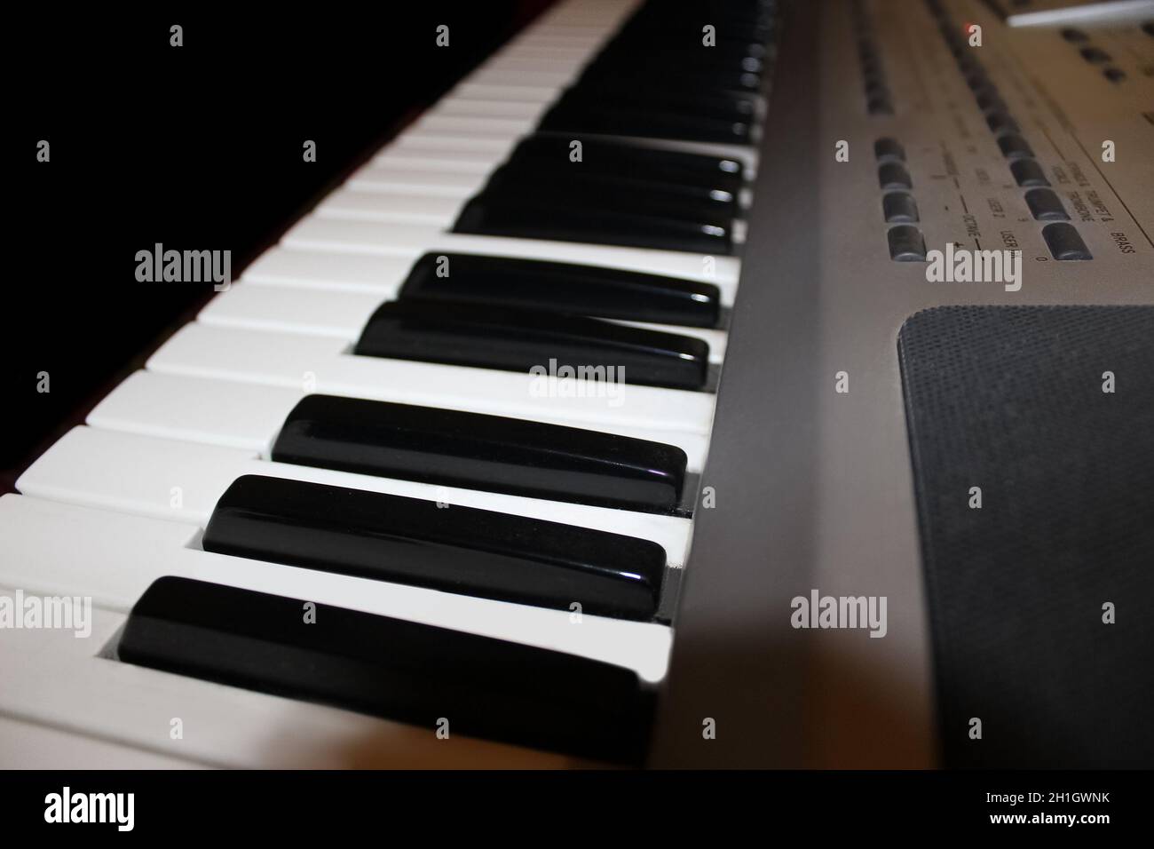 New modern pipe organ keyboard side view. Simple electronic instrument ...