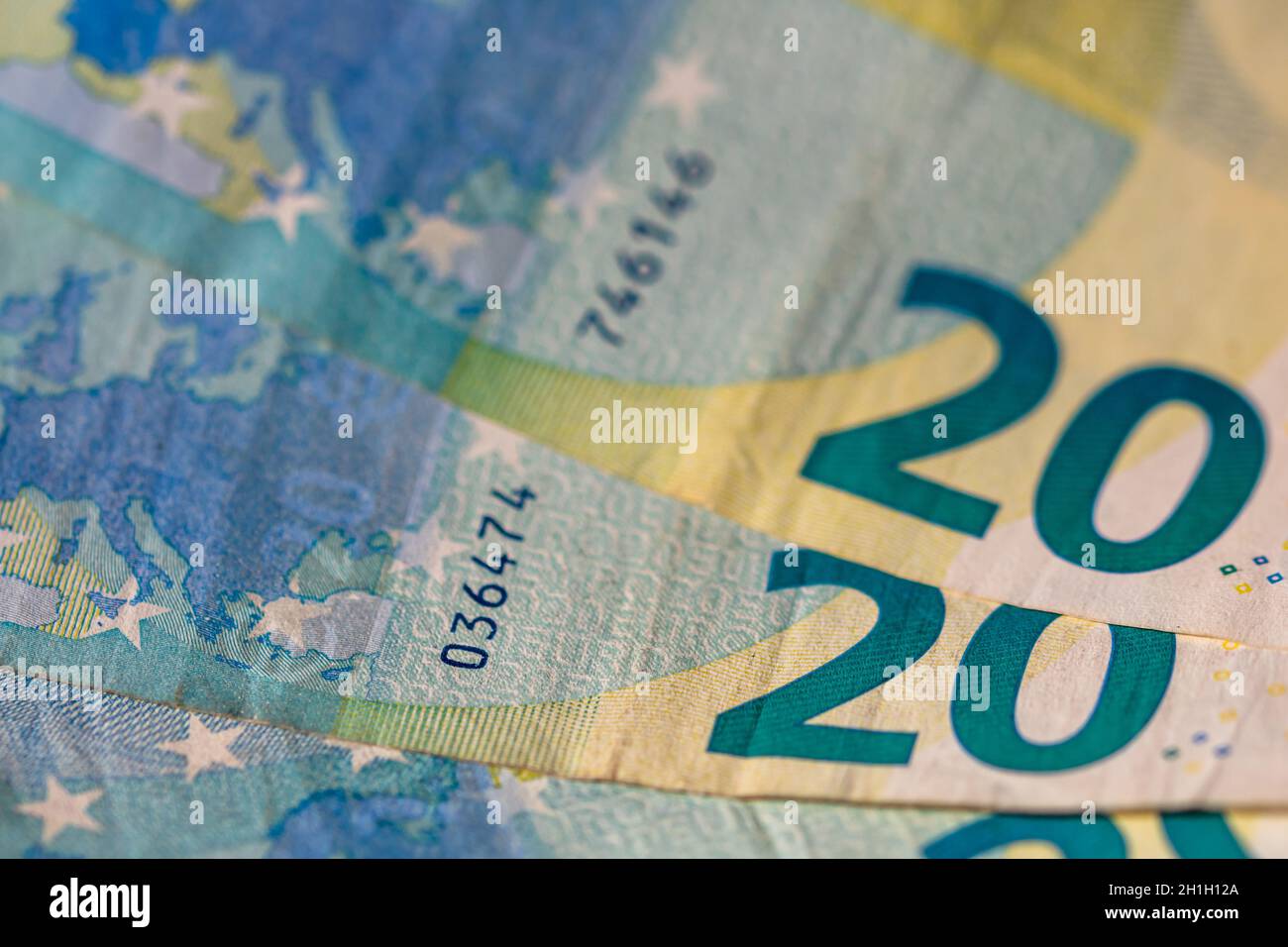 Selective focus on detail of EURO banknotes. Counting or giving EURO ...