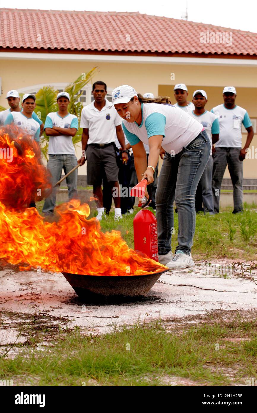 Person using fire extinguisher hi-res stock photography and images - Alamy