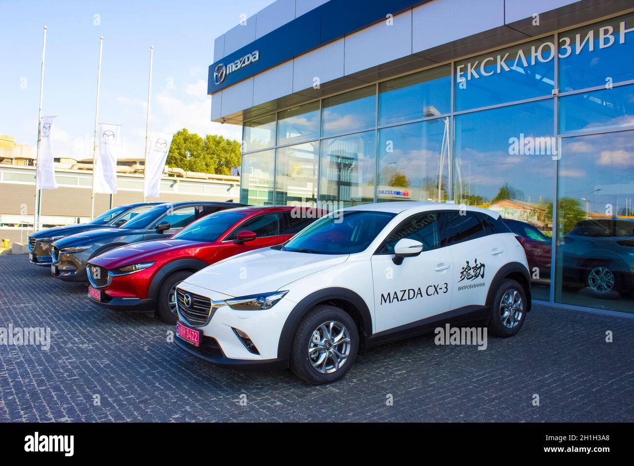 Kyiv, Ukraine - August 15, 2020: retail of Mazda logo on store front ...
