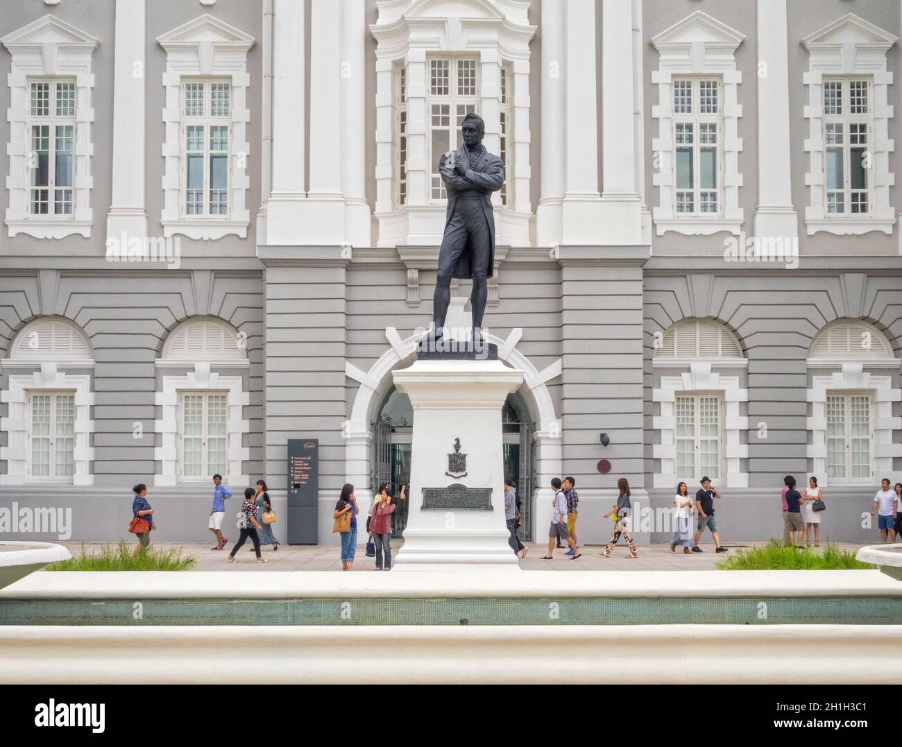 Bronze statue of Stamford Raffles by Thomas Woolner in front of the ...