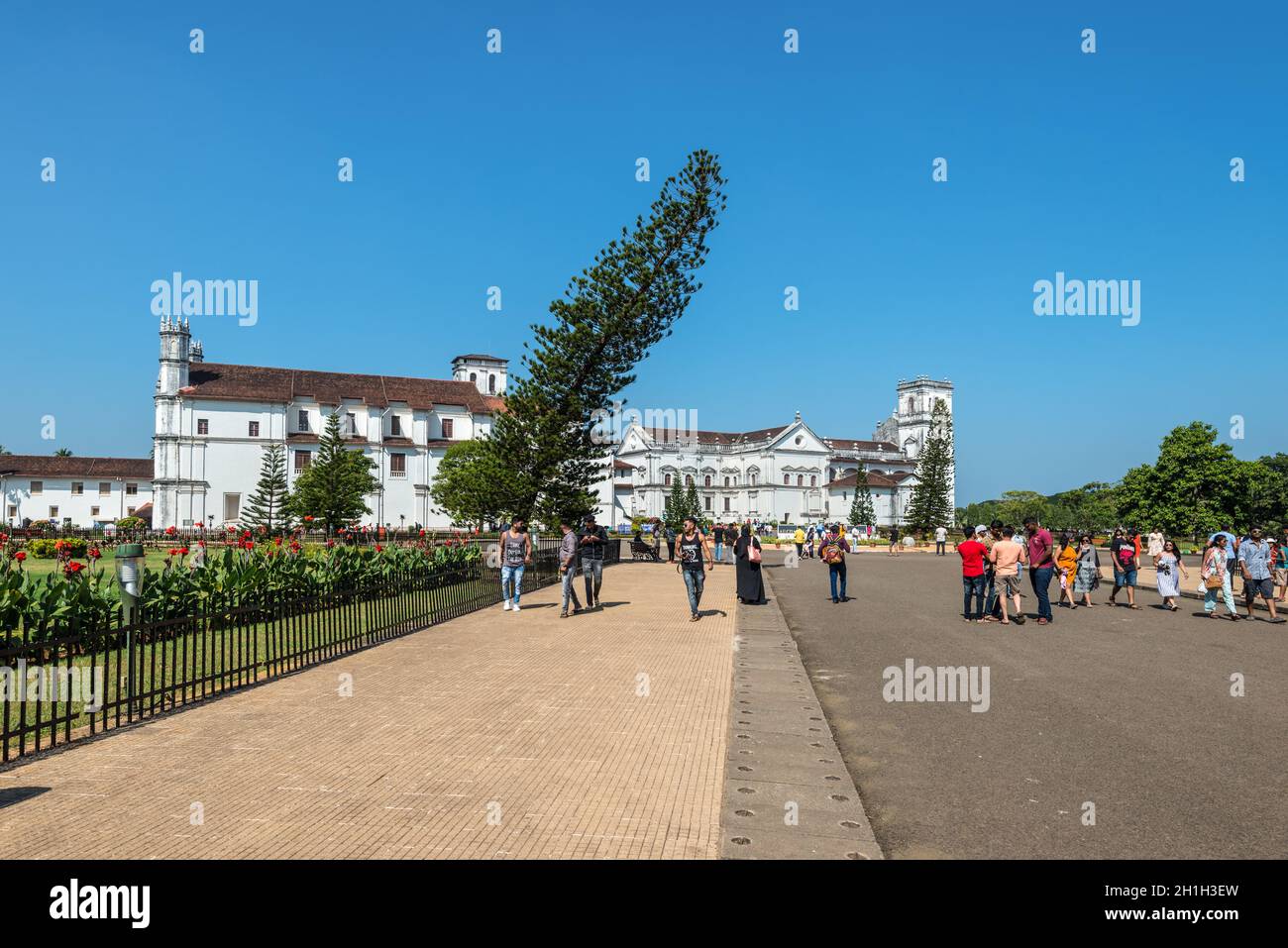 Old Goa, India - November 23, 2019: Tourists and locals in front of the ...