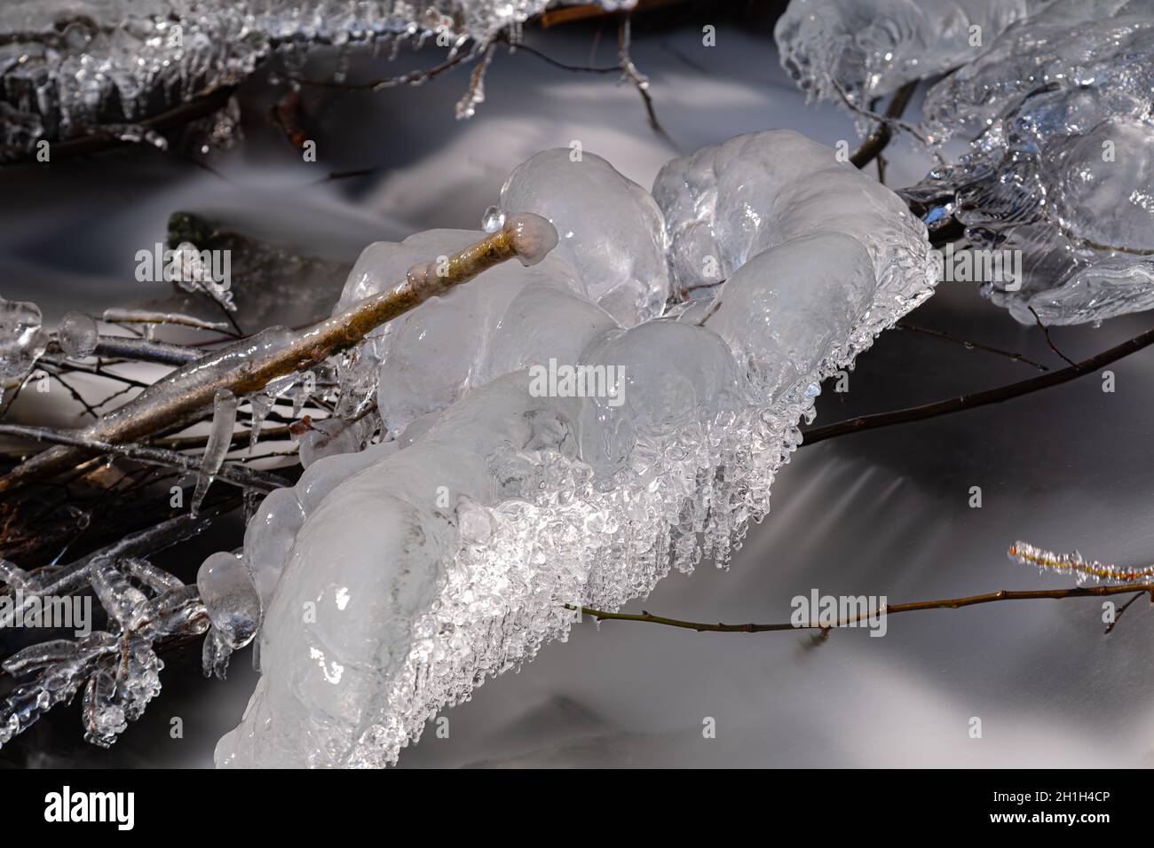 sculptures of Ice hanging over a waterfall Stock Photo - Alamy