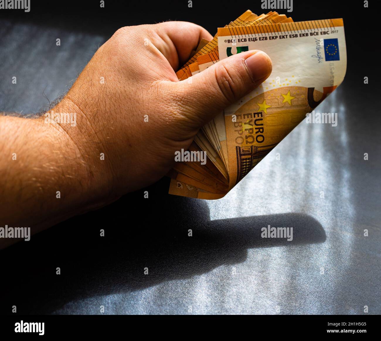 Man counting money, counting EURO close up Stock Photo - Alamy