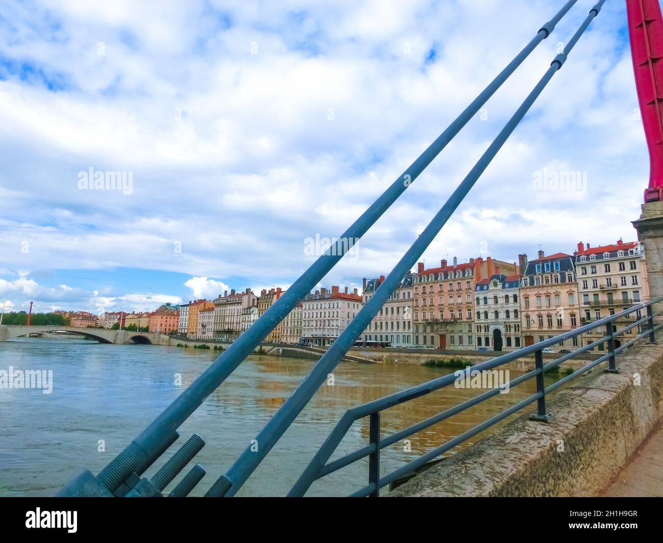 Bridge across river Rhone on winter sunny day, Lyon, France Stock Photo ...