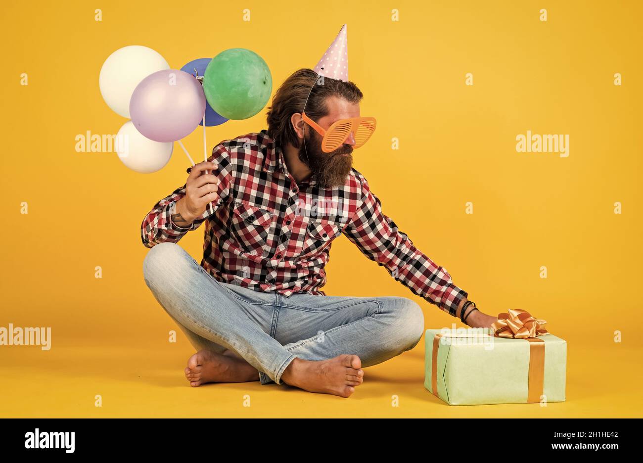 open gift. hipster smiling happily. having fun on party. prepare for ...
