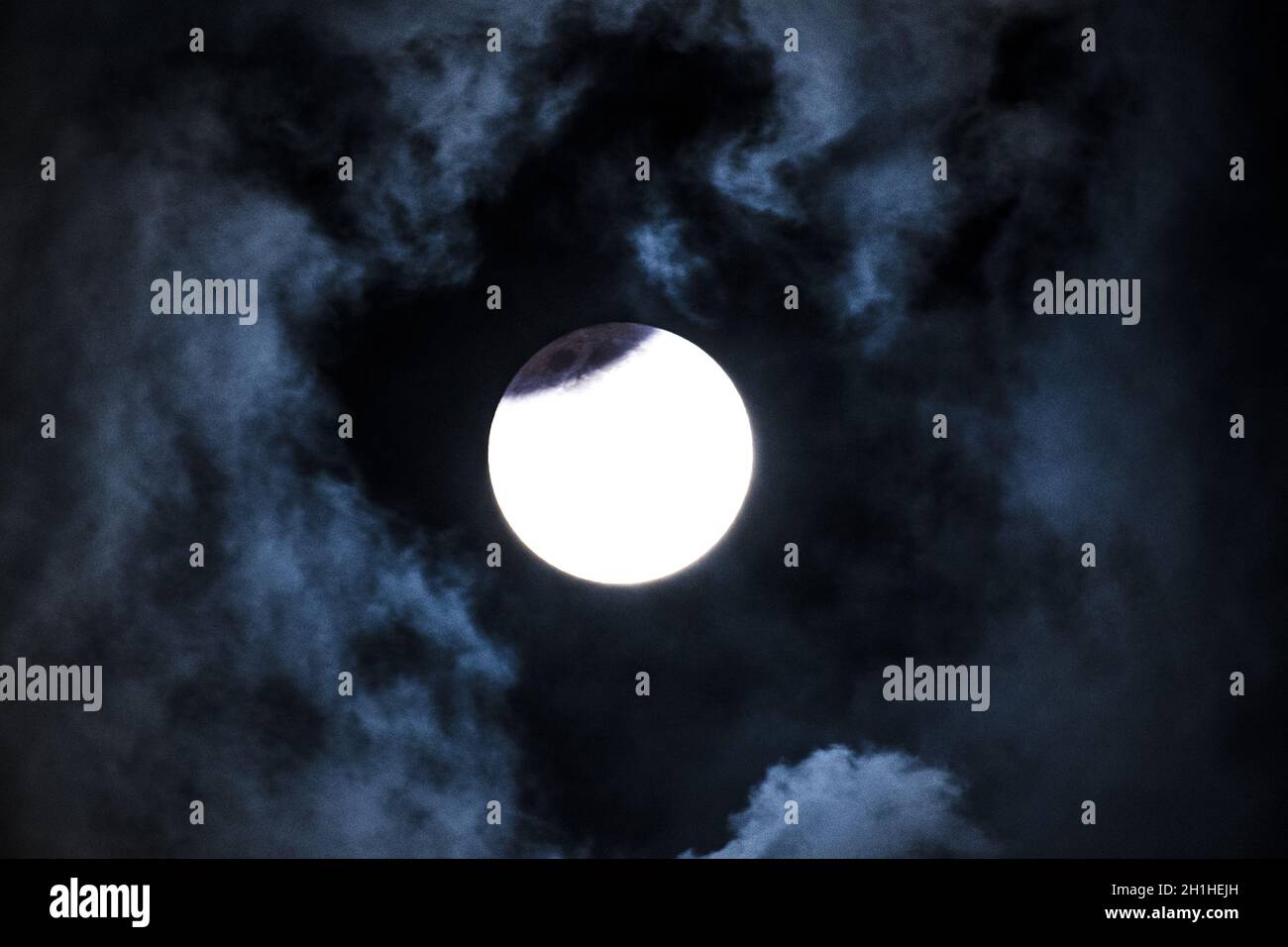 Lunar Eclipse looking like an eye, Thailand Stock Photo - Alamy