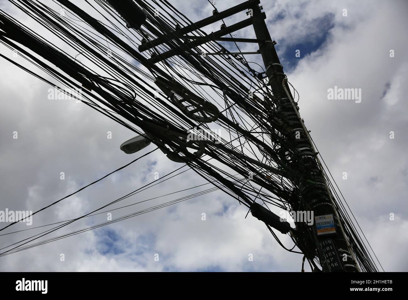 salvador, bahia / brazil - september 11, 2020: Post loaded with wires ...