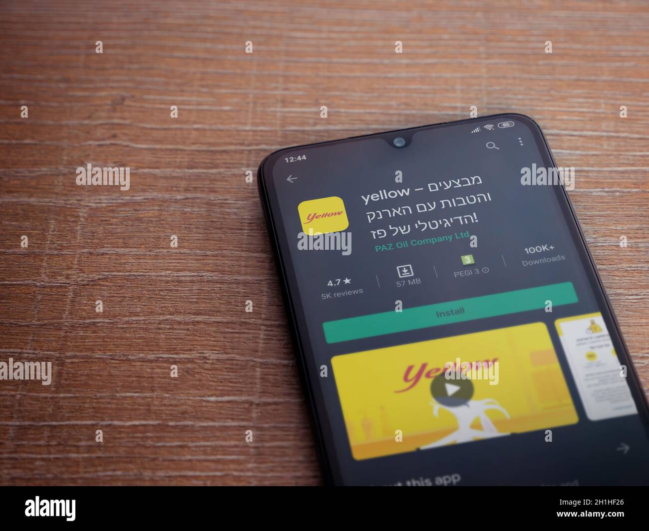 Lod, Israel - July 8, 2020: Yellow app play store page on the display ...