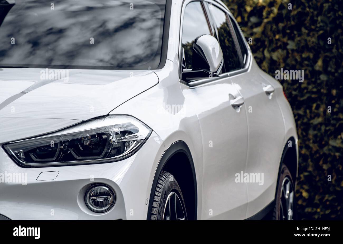 Front view cropped image of white suv car Stock Photo - Alamy
